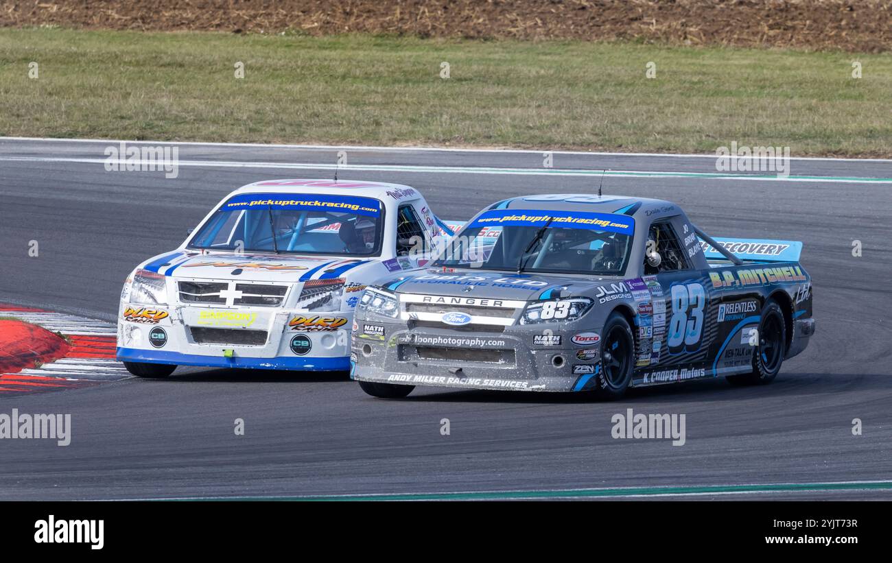 Matthew Simpson (L) and Dale Gent battle through Williams during the ...