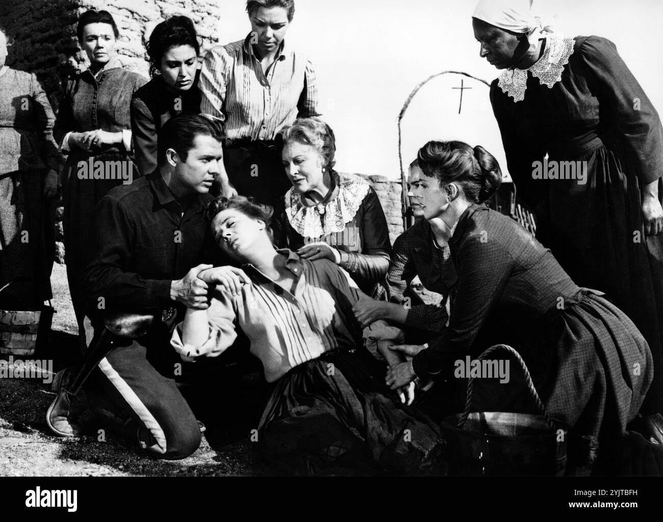 Audie Murphy, Jeff Donnell, Ernestine Wade, on-set of the western film ...