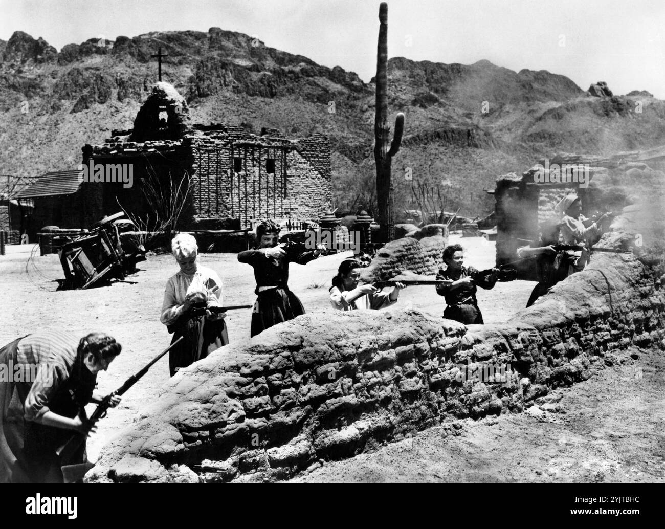 Hope Emerson (left), Peggy Maley (second left), on-set of the western ...