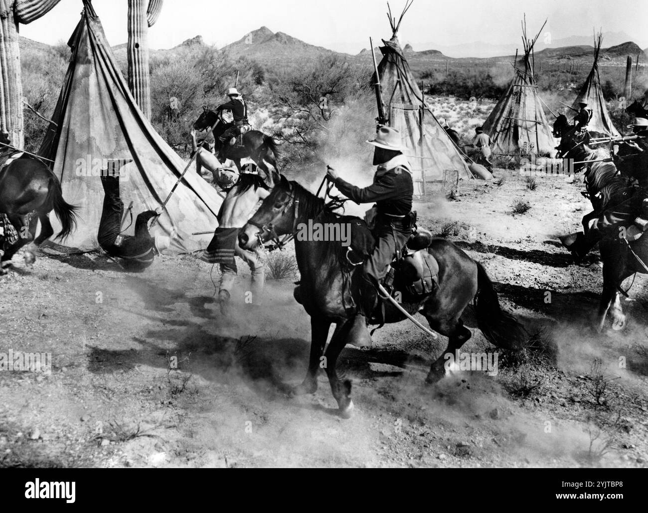 U.S. Cavalry attacking Apache village, on-set of the western film, "The ...