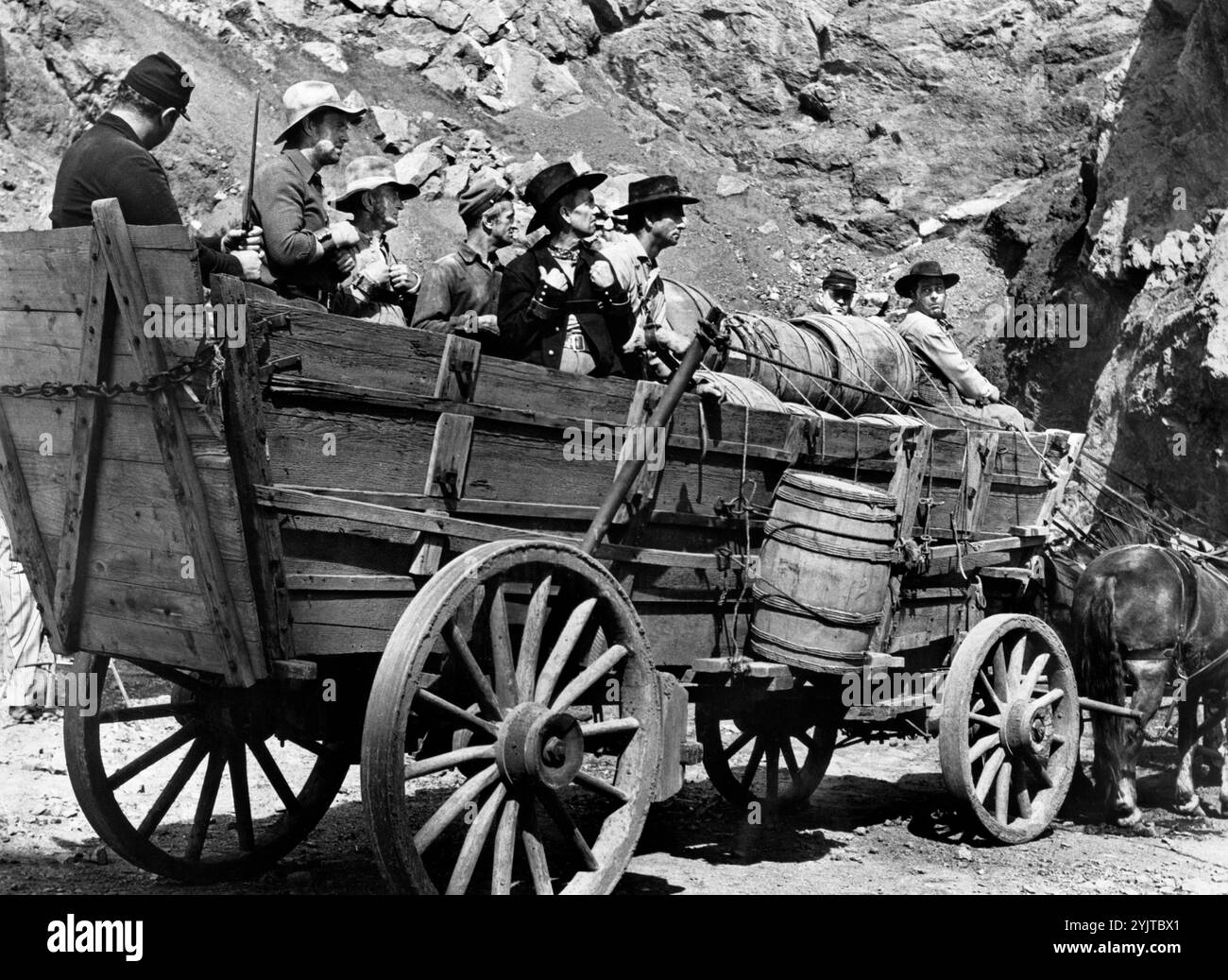 Sterling Hayden (second, left), on-set of the western film, "Hellgate ...