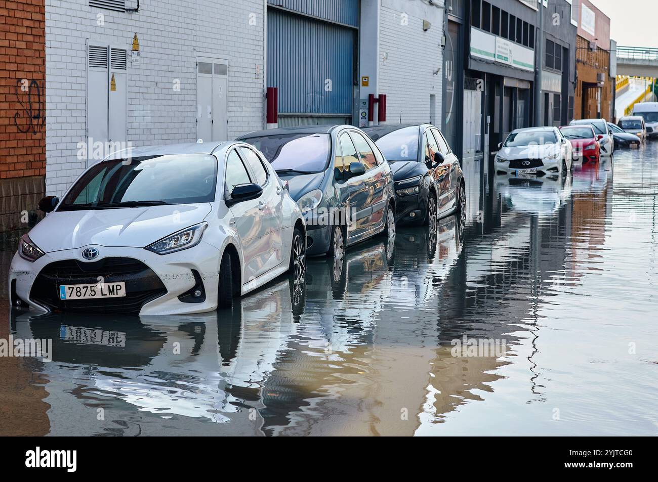 Viladecans. Spain - November 15,2024: An urban street is inundated with ...