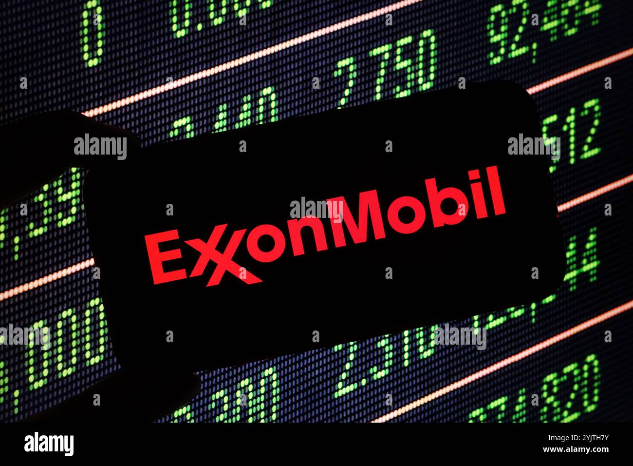 In this photo illustration, the Exxon Mobil company logo is seen ...
