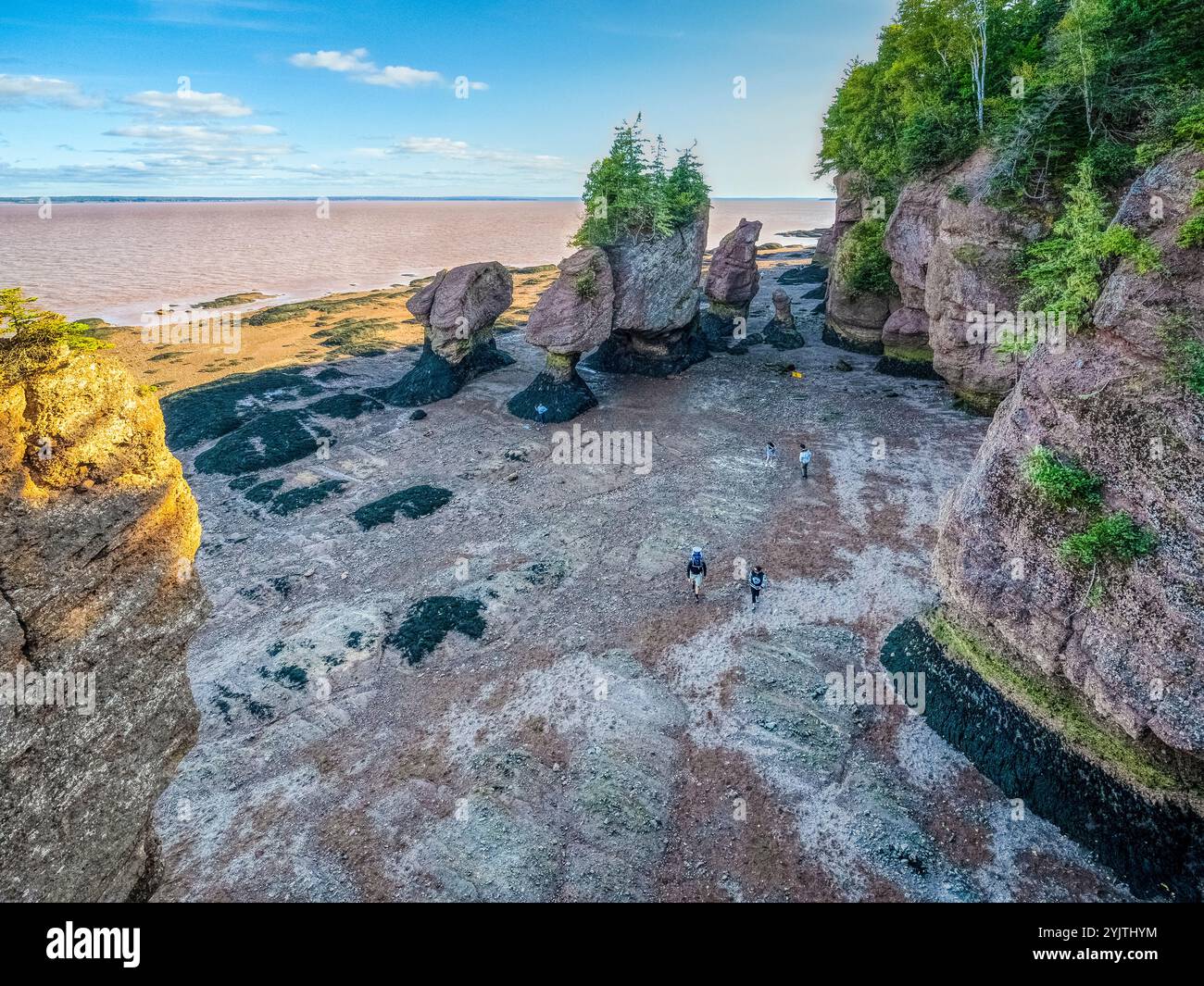Peoplpe walking in Staircase Cove among the Sea Stacks on the Ocean ...
