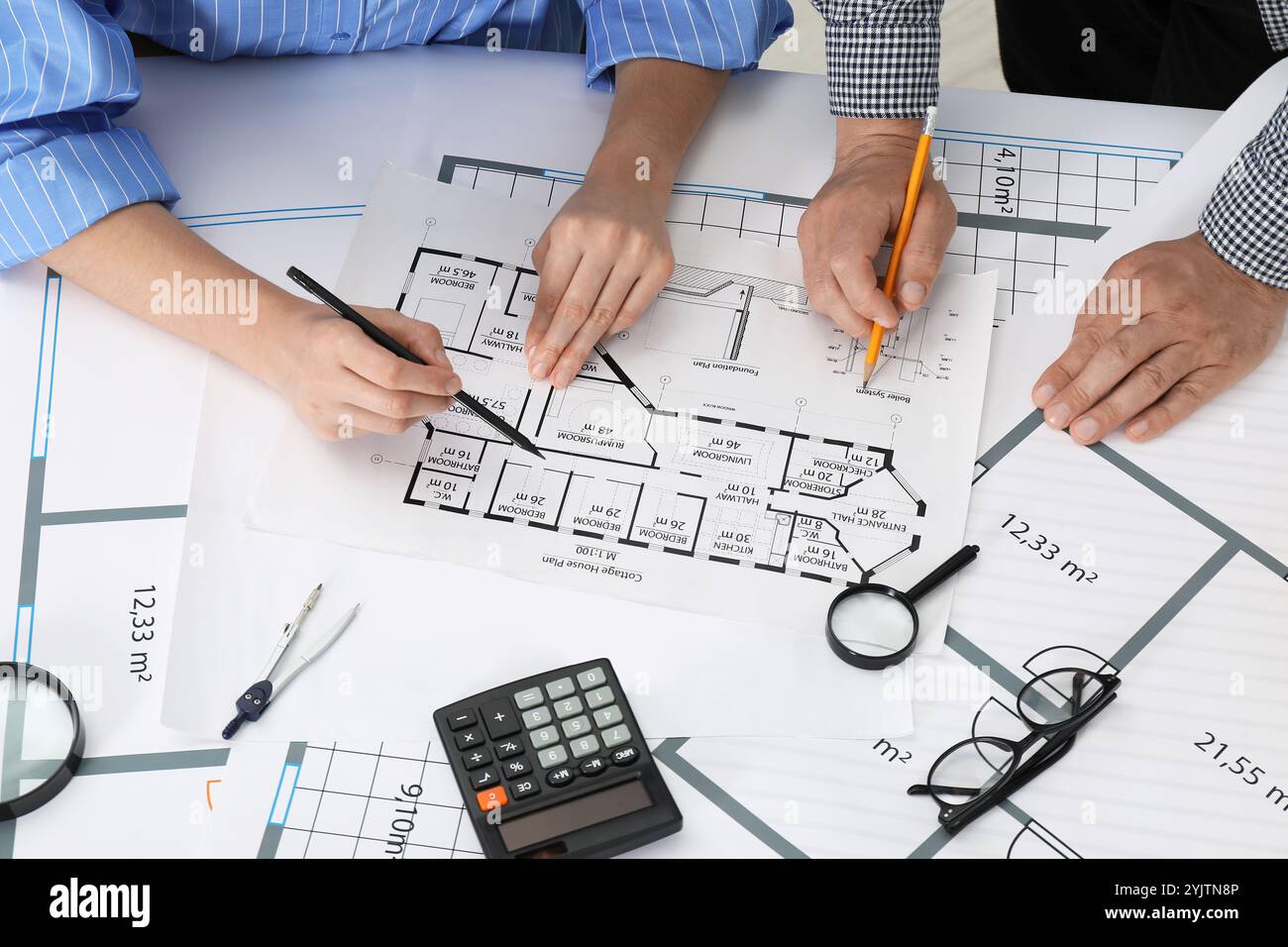 Architects working with project at table in office, top view Stock ...