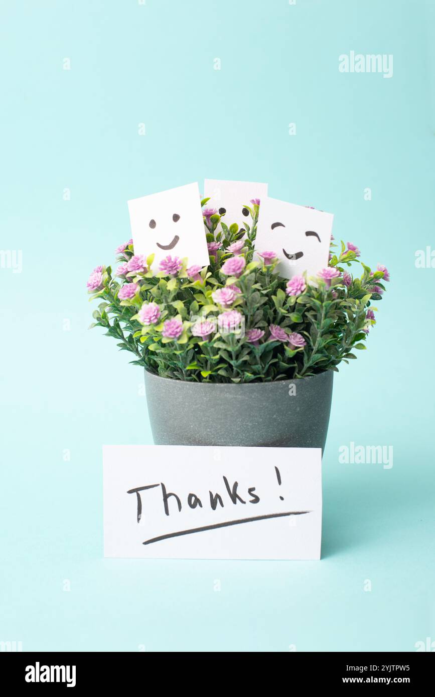 Thank you card with flowers and a happy smiling face, being thankful ...