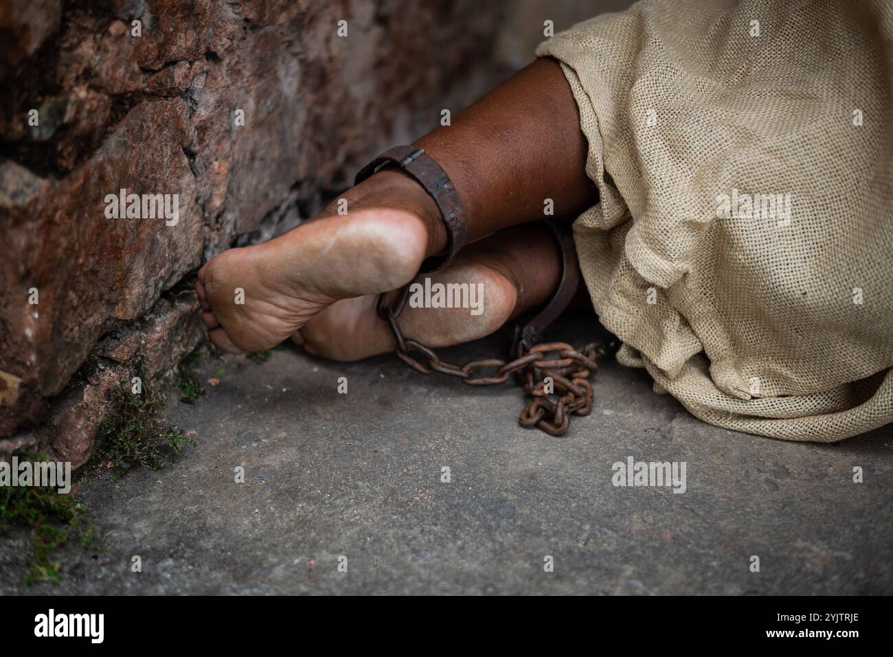 Detail of the chained feet of a black woman in Pelourinho. Slavery in ...