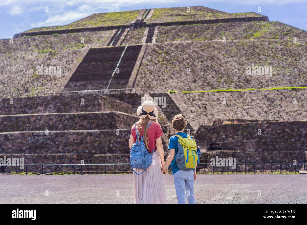 Mother and son tourists exploring Teotihuacan, Mexico. Cultural ...