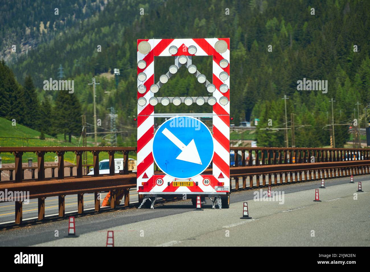 Italy - 11 May 2024: Roadworks detour on the road. Caution, traffic is ...