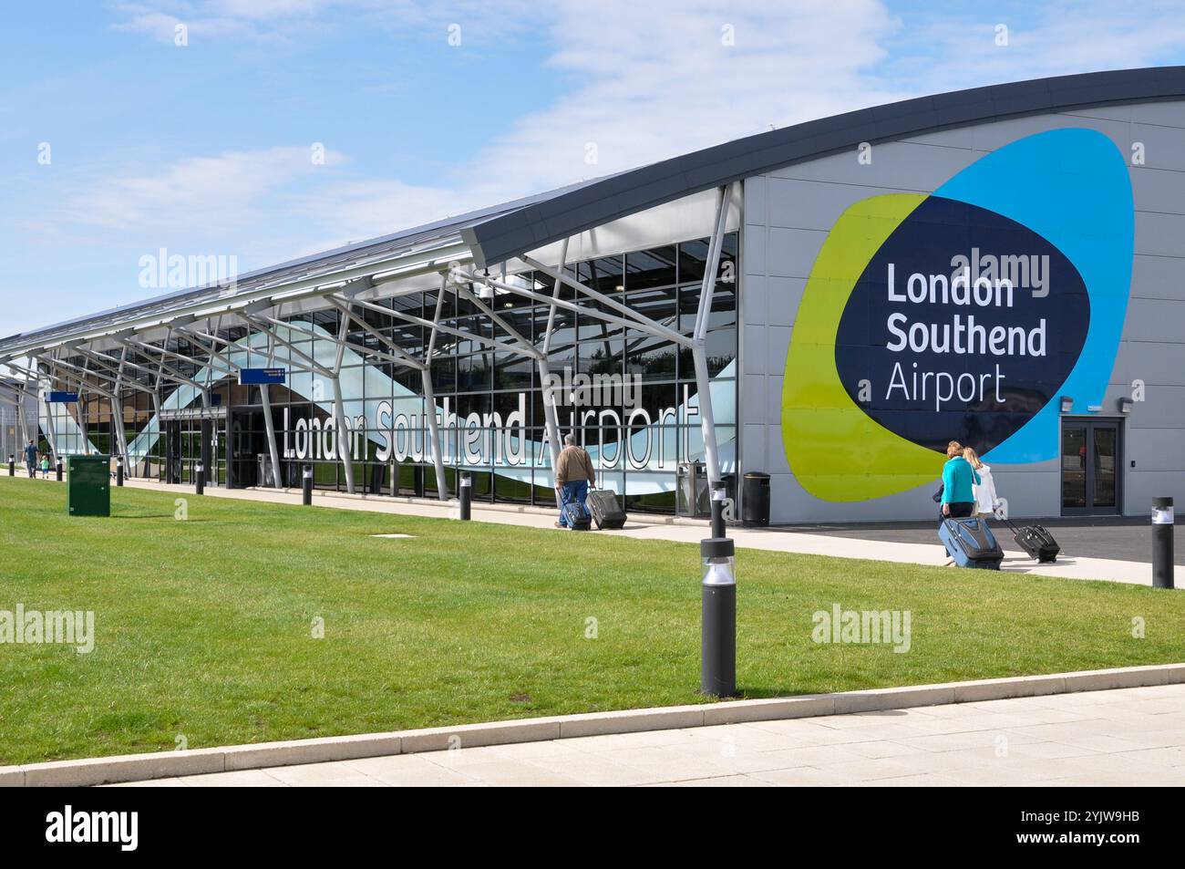 London Southend Airport. Passengers with luggage heading towards the ...