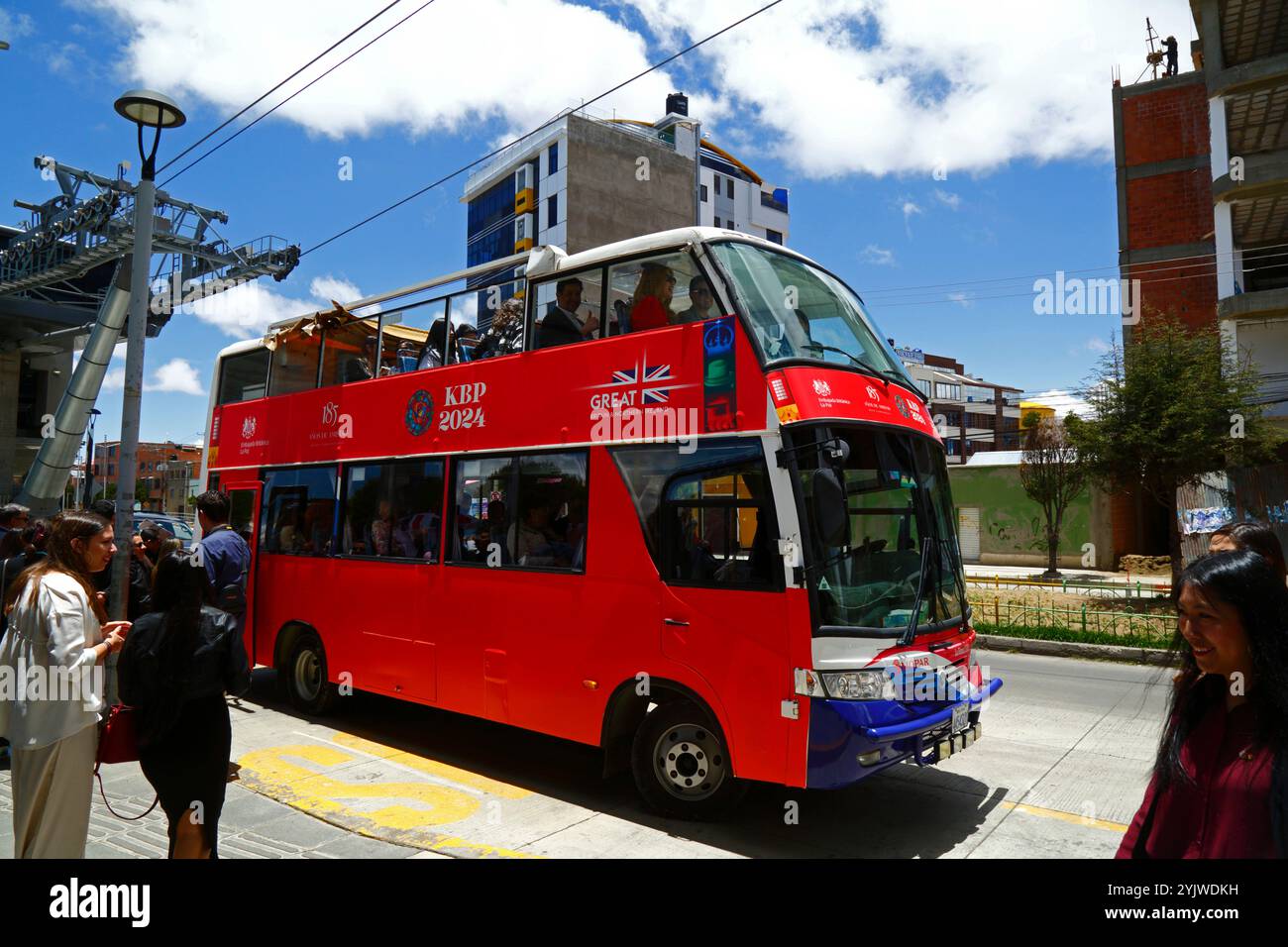 El Alto, BOLIVIA; November 15th 2024: A red double-decker bus waits ...