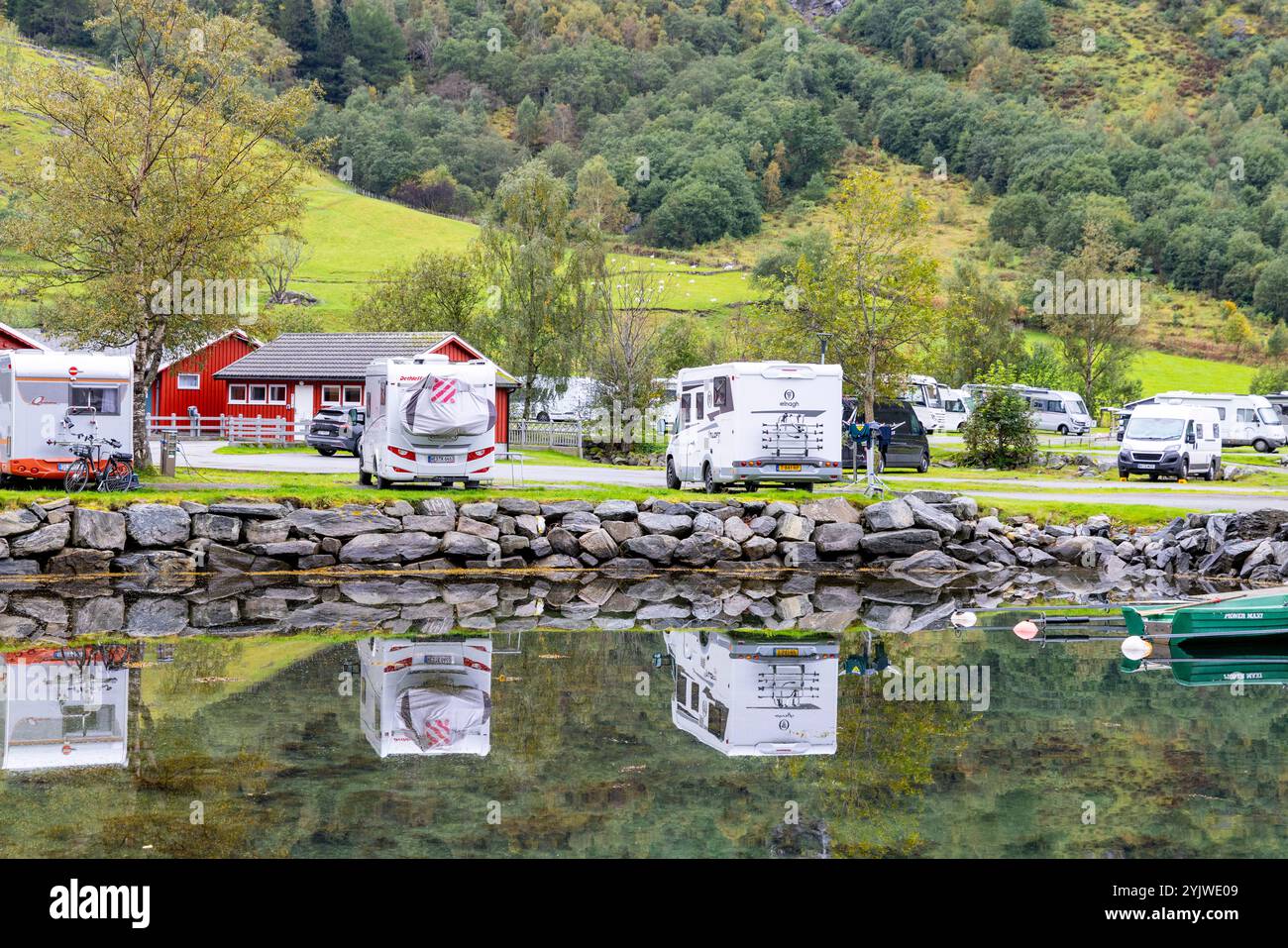 Motorhome and camping site in Geiranger village with reflections in ...
