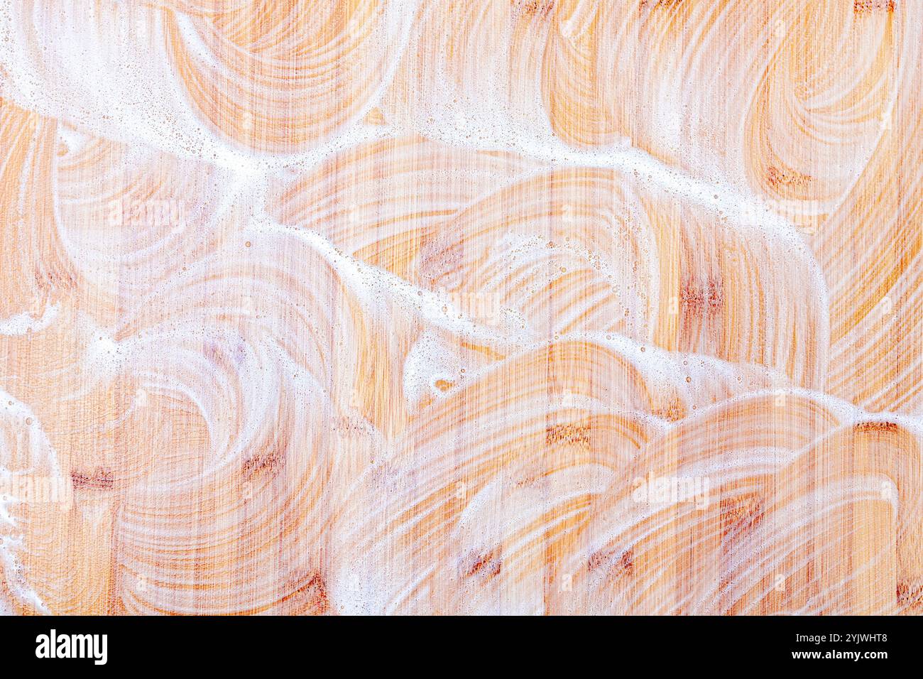 Soap suds. Foam on an empty wooden surface. Cleaning background Stock ...