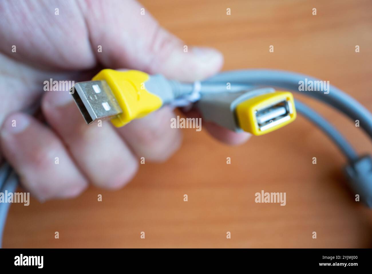 Hand connect micro usb cable hi-res stock photography and images - Alamy