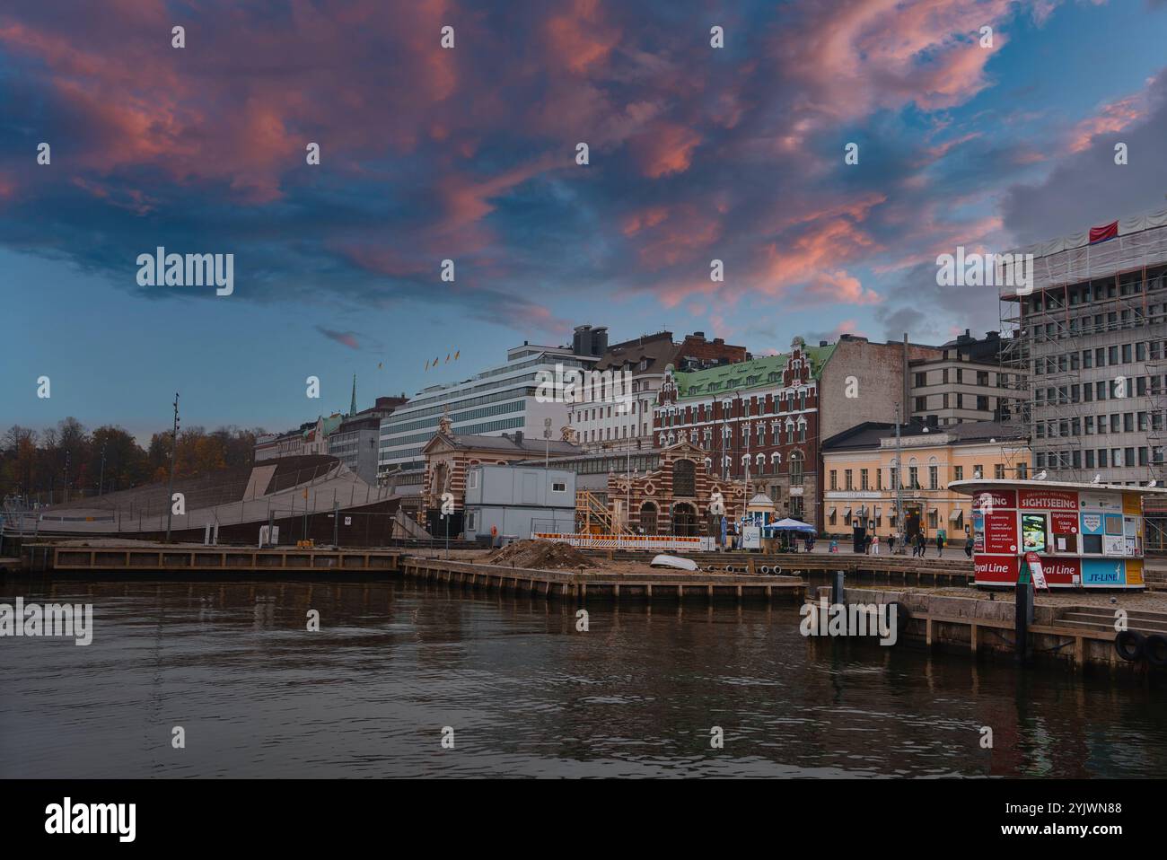 View of Helsinki's waterfront showcasing a red brick building amidst ...