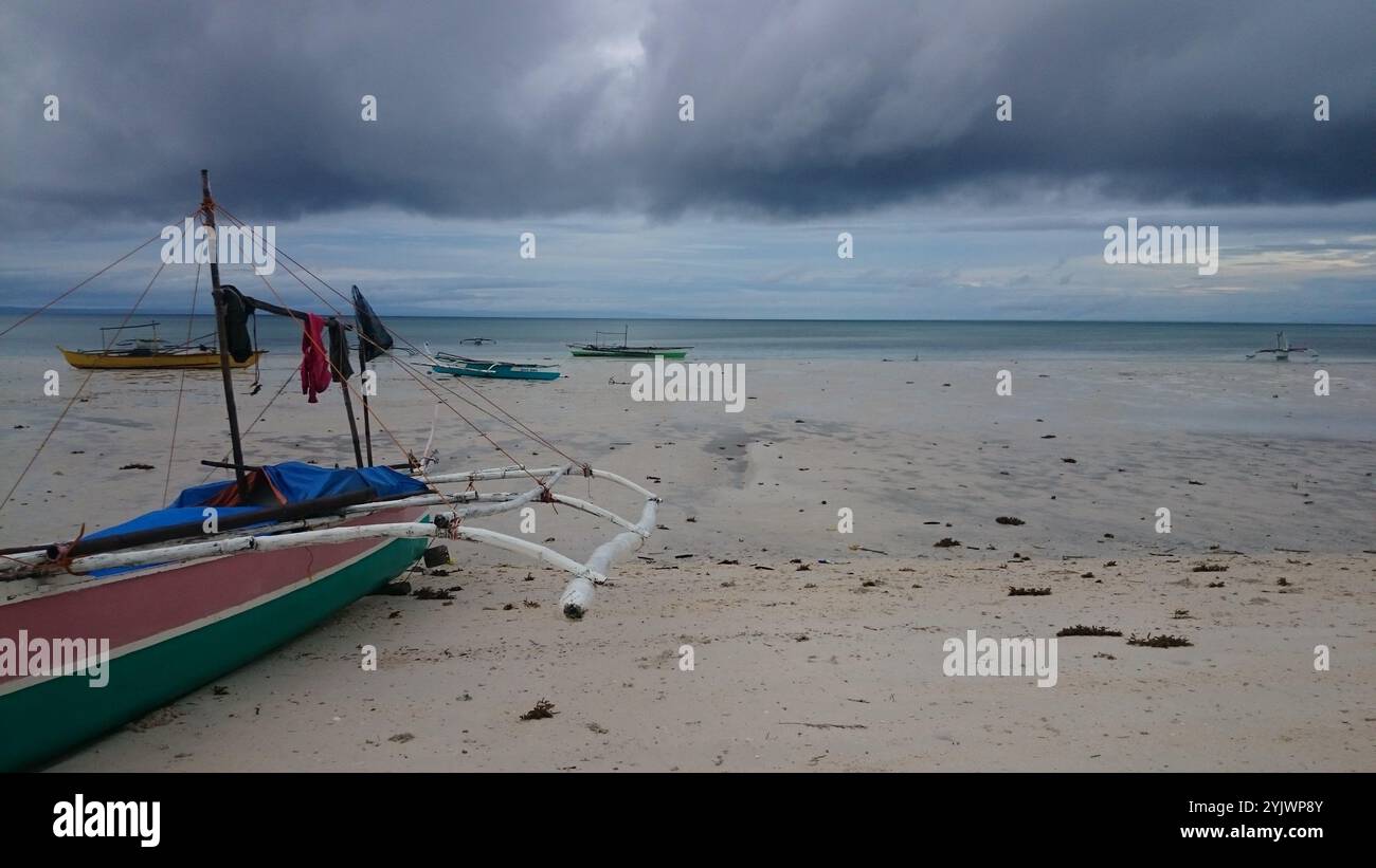 Double outrigger dugout canoe hi-res stock photography and images - Alamy