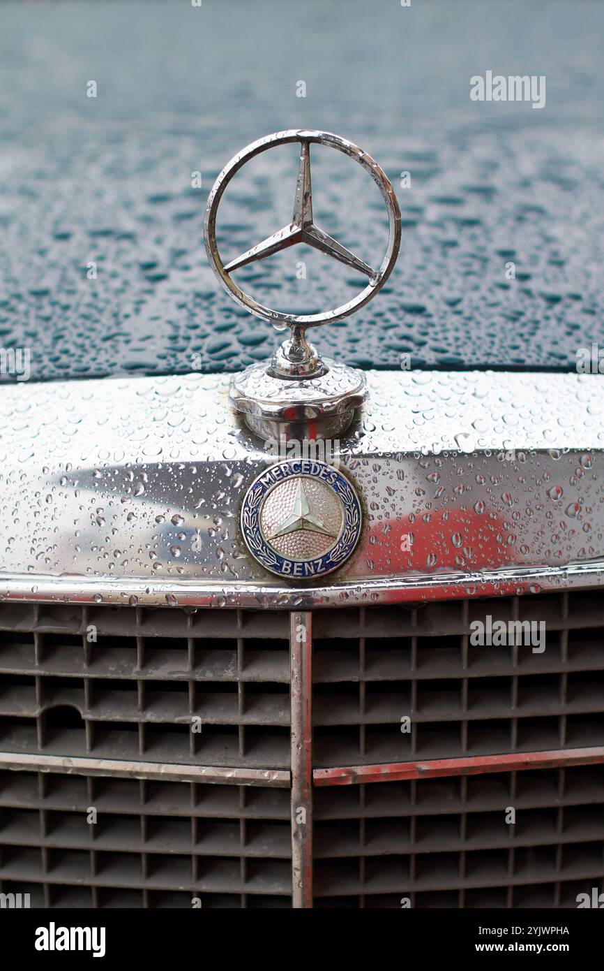 Mercedes-Benz logo on a vintage classic Mercedes-Benz W114 released ...