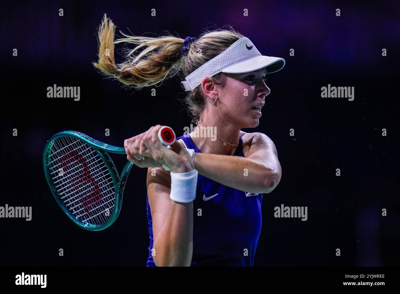 Katie Boulter, of Britain, returns the ball against Germany's Laura ...