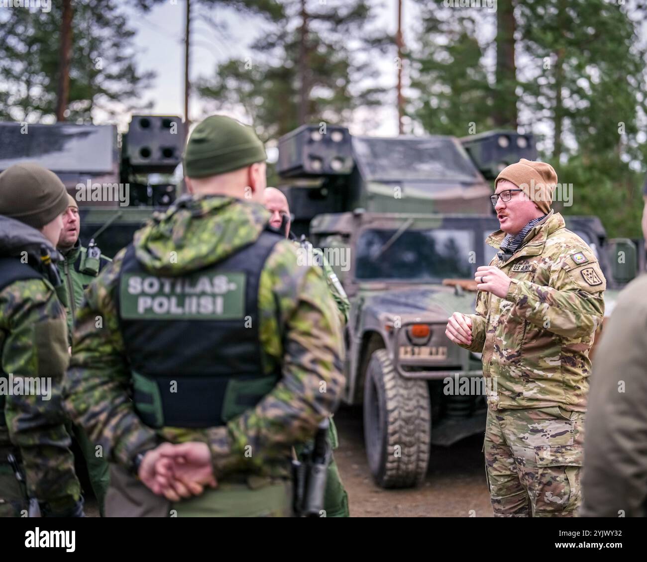 A Soldier from 1st Battalion, 57th Air Defense Artillery instructs ...
