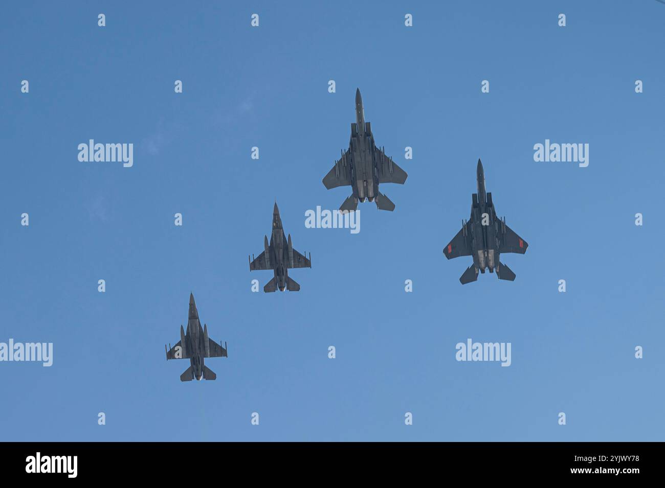 A U.S. Air Force F-15EX Eagle II, F-15E Strike Eagle, and two F-16 ...