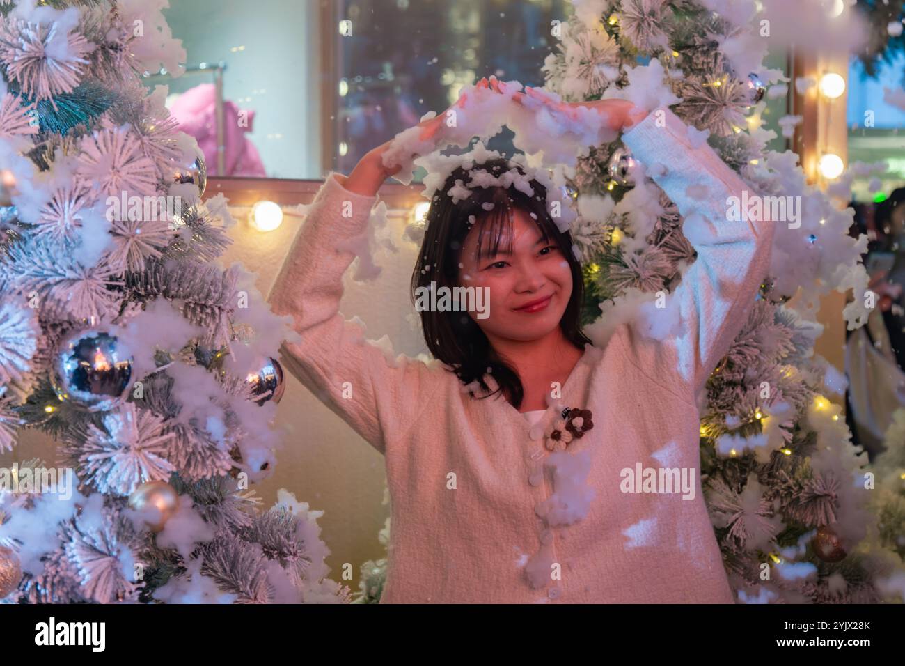 CHONGQING, CHINA- NOVEMBER 15, 2024 - A beautiful woman poses in front ...