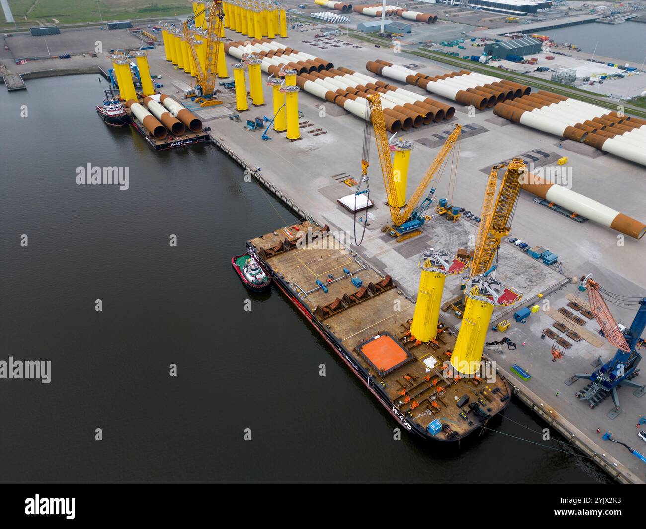Defzijl, The Netherlands - May 26th 2024 -A tugboat and pontoon for ...