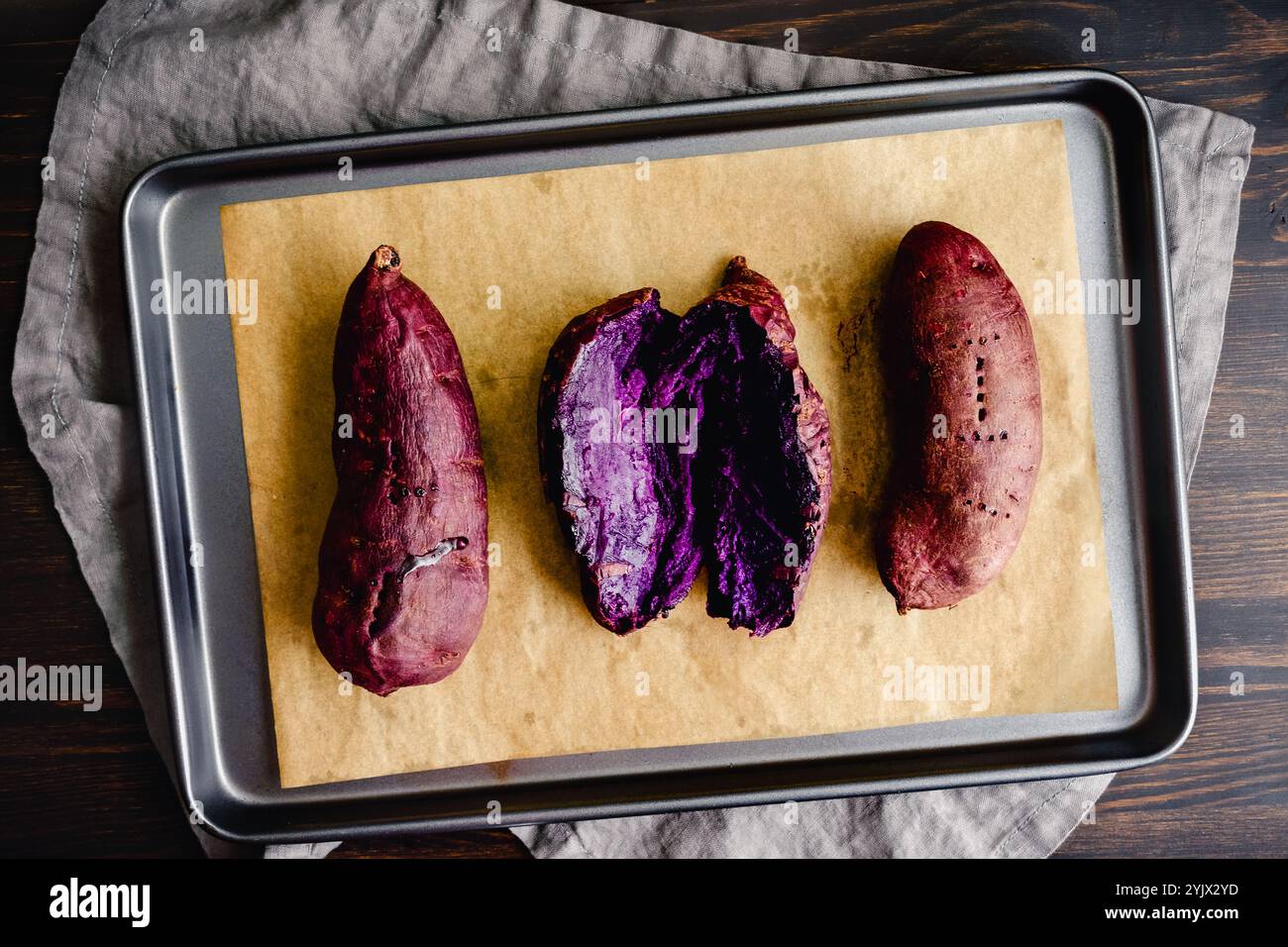 Roasted Purple Sweet Potatoes on a Sheet Pan: Whole and sliced baked ...