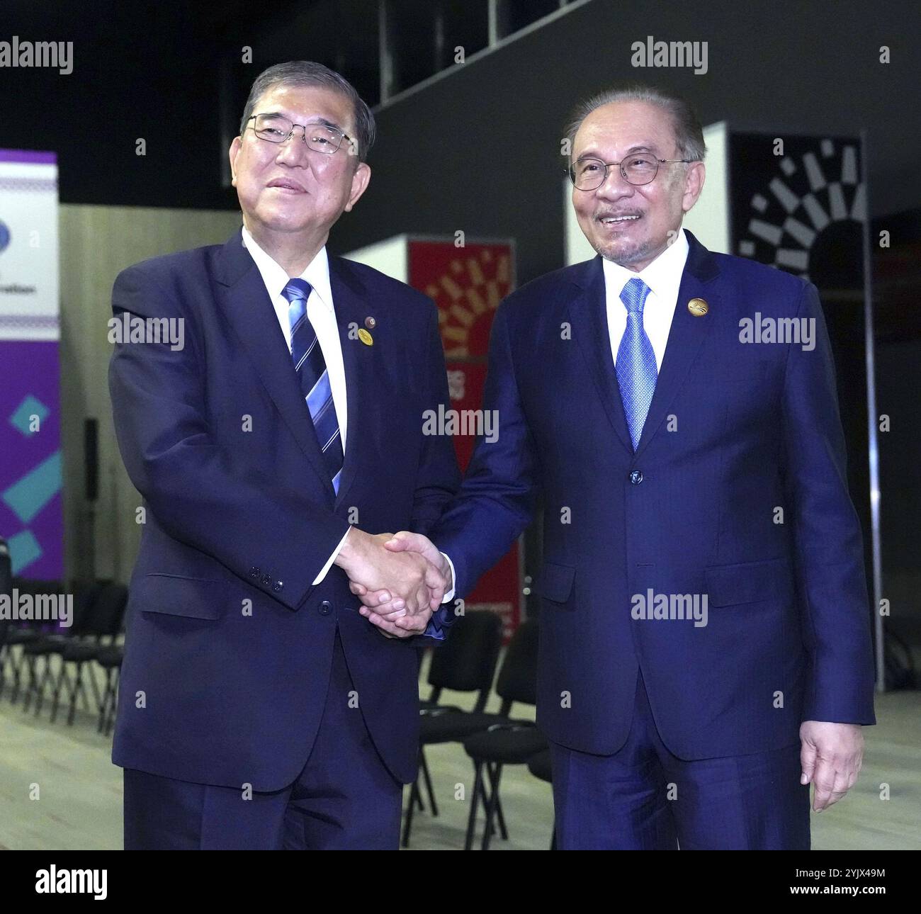 Japan's Prime Minister Shigeru Ishiba (L) and Malaysia's Prime Minister ...