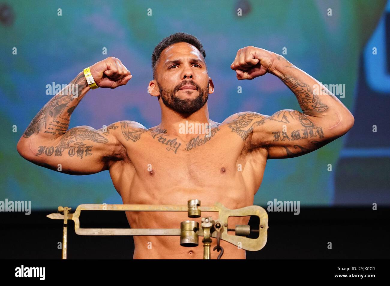 NEW YORK CITY, NY -NOVEMBER 15:Eryk Anders steps on the scale for the ...
