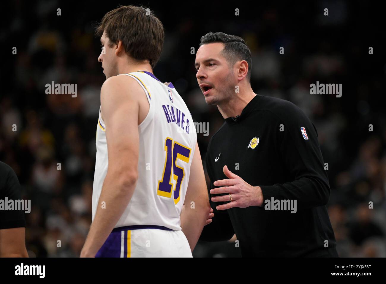 Los Angeles Lakers head coach J.J. Redick, right, speaks with guard ...