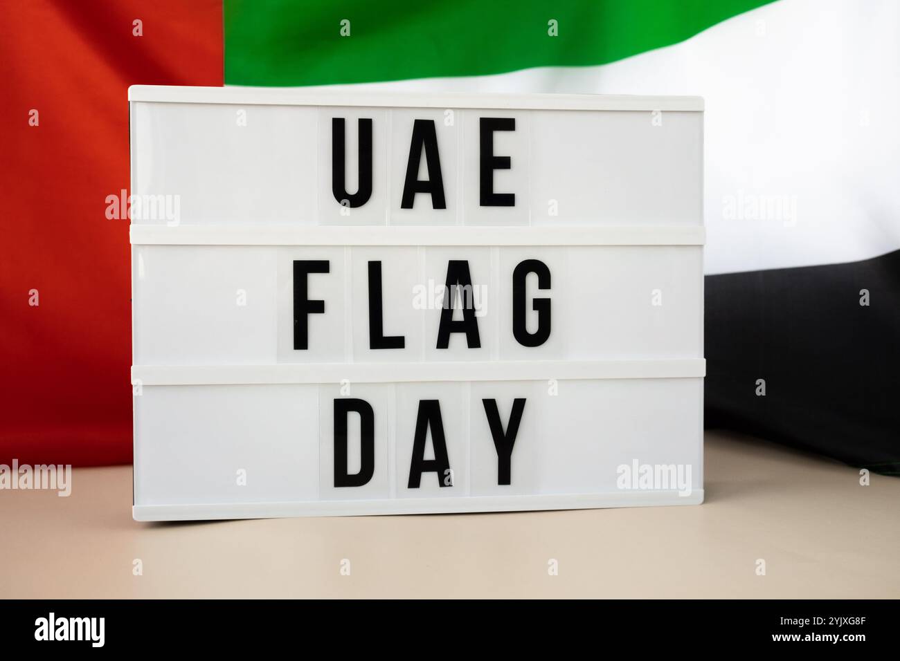 Message with text UAE FLAG DAY on United Arab Emirates waving flag made ...
