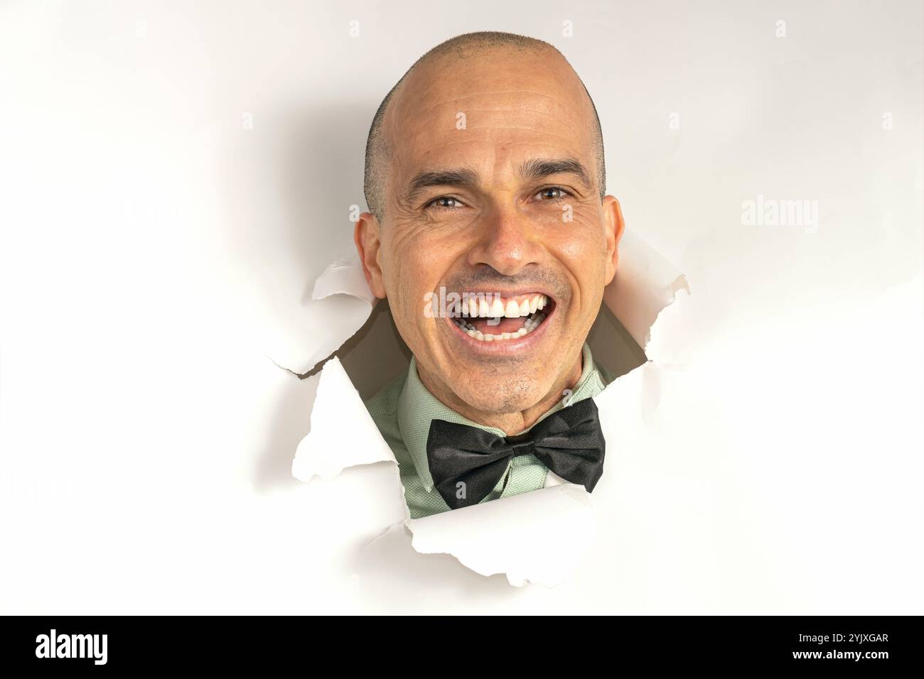 48 year old man in casual clothing and a bow tie, with only his head on ...