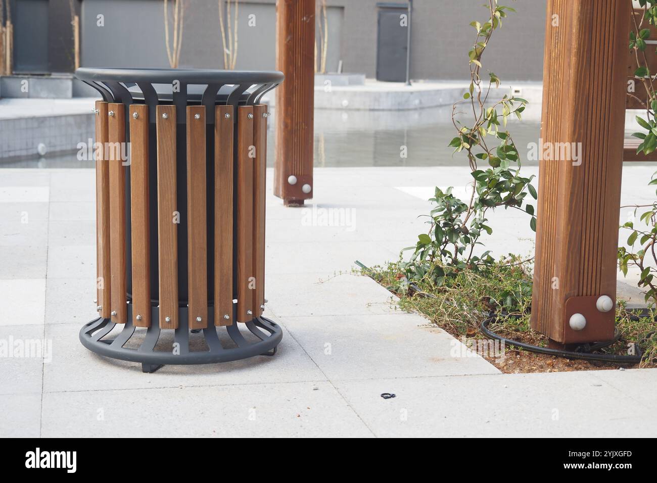 Stylish trash bin with a beautiful wood and metal design for modern ...