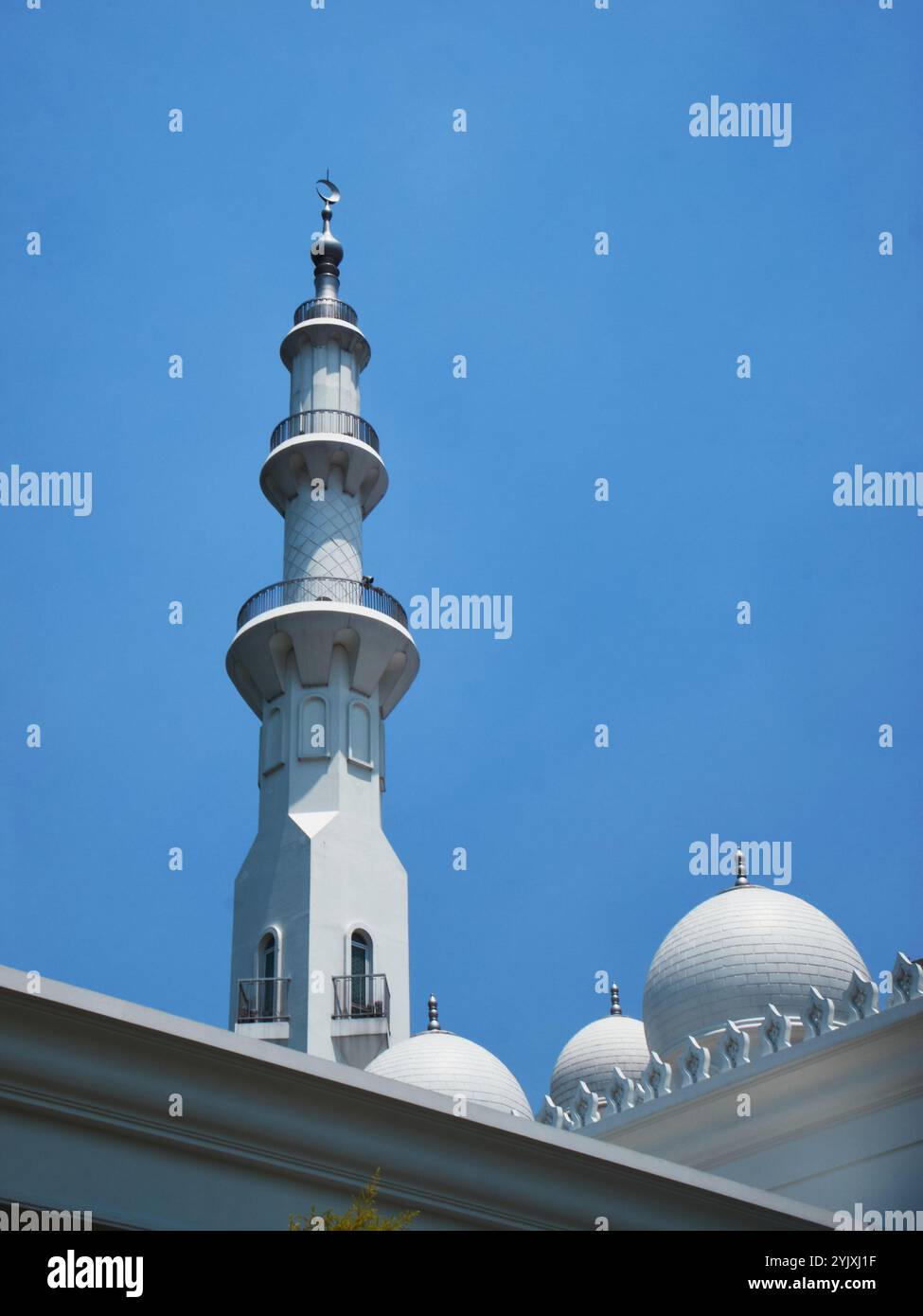 The architectural details of the magnificent mosque show its three ...