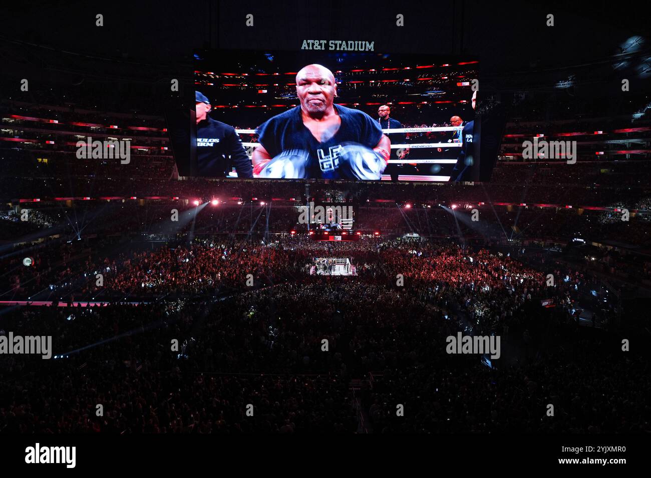 Mike Tyson walks to the ring before heavyweight boxing match against ...