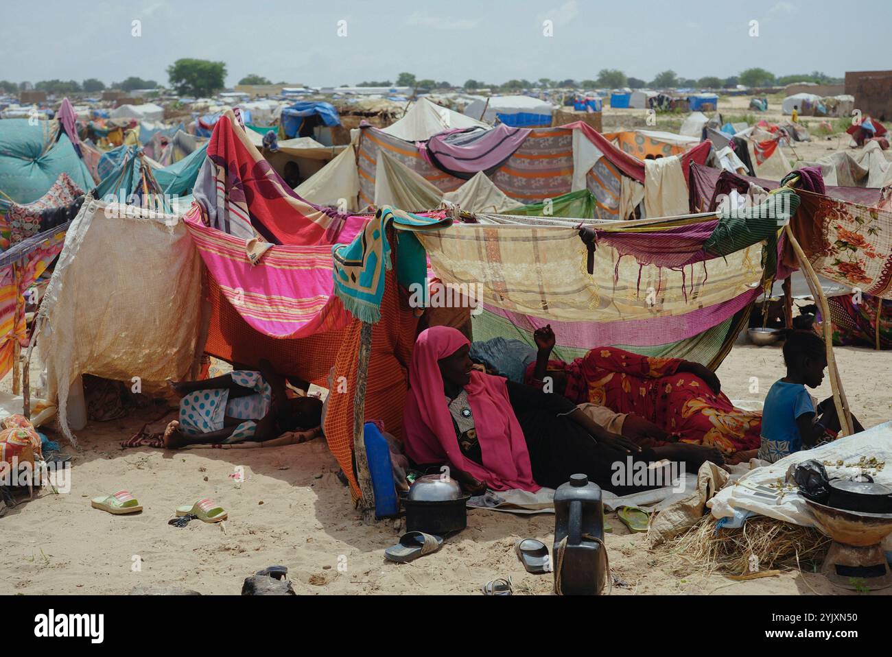 Women who fled war in Sudan rest in a refugee camp in Adre, Chad ...