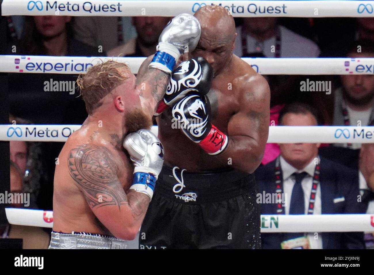 Jake Paul lands a left to Mike Tyson during their heavyweight boxing ...