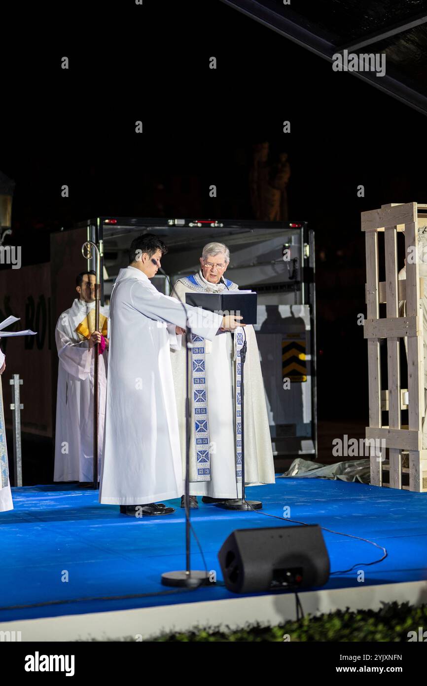 Paris Archbishop Laurent Ulrich delivers a prayer next to the "Vierge a ...