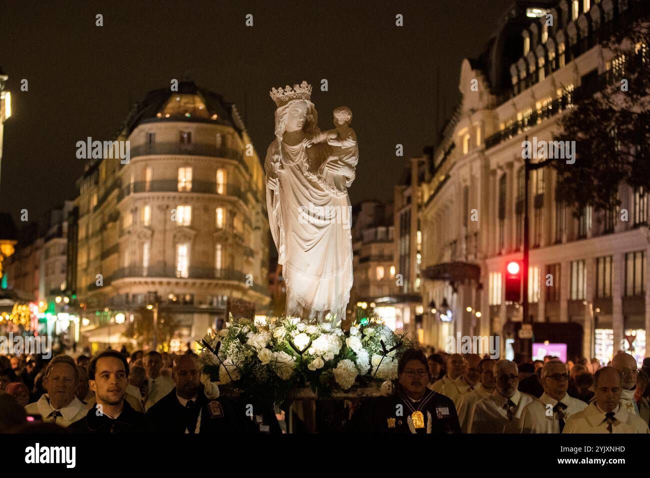 Torchlight procession through the streets of Paris to celebrate the ...