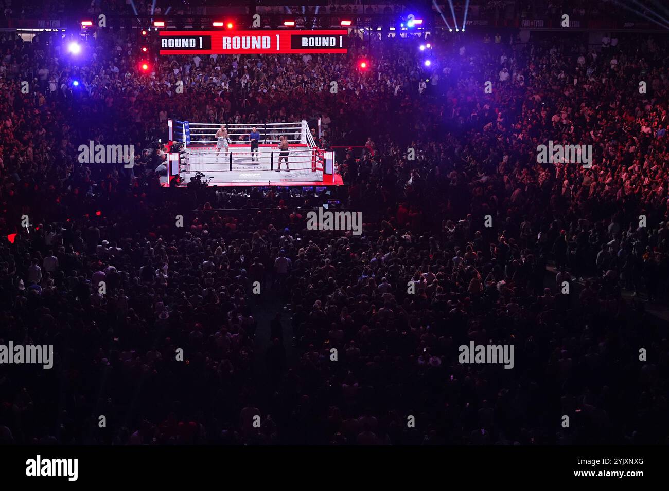 Jake Paul and Mike Tyson fight during their heavyweight boxing match ...