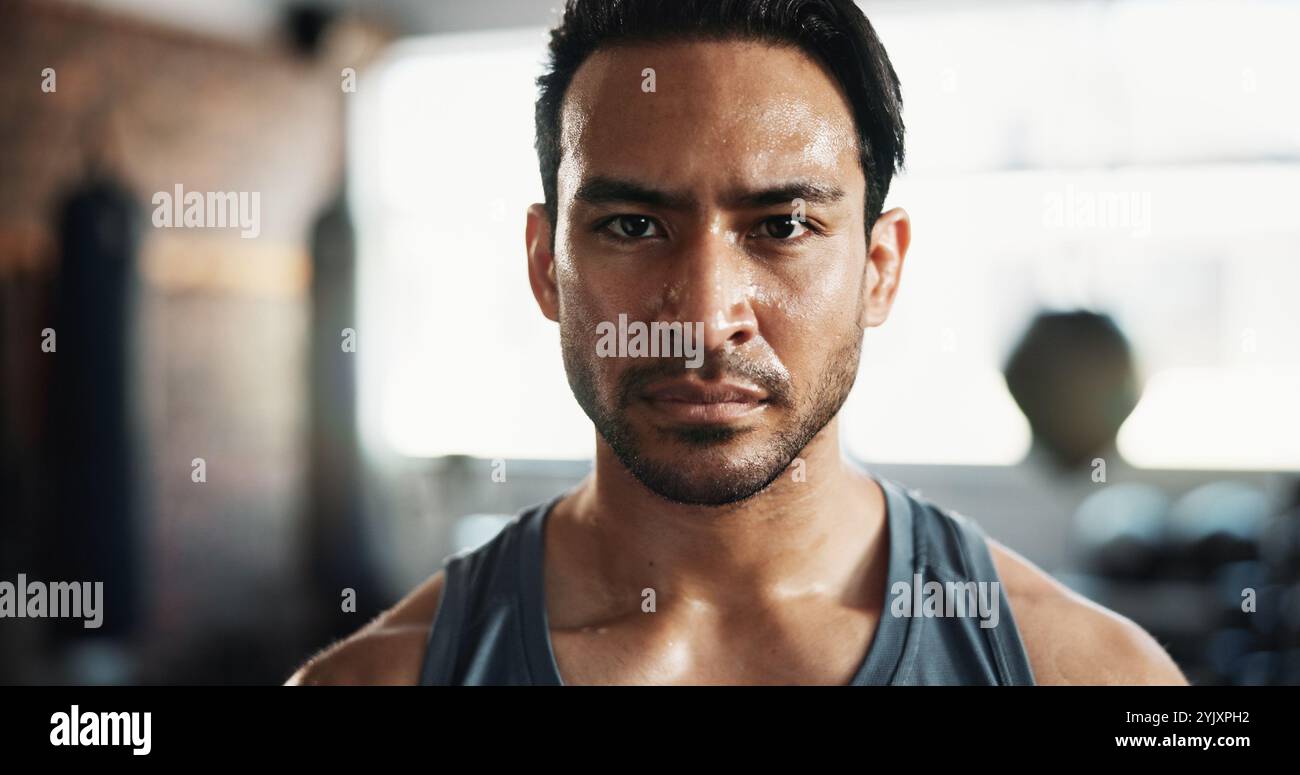 Man, sweat and portrait as serious for exercise, intense workout and ...