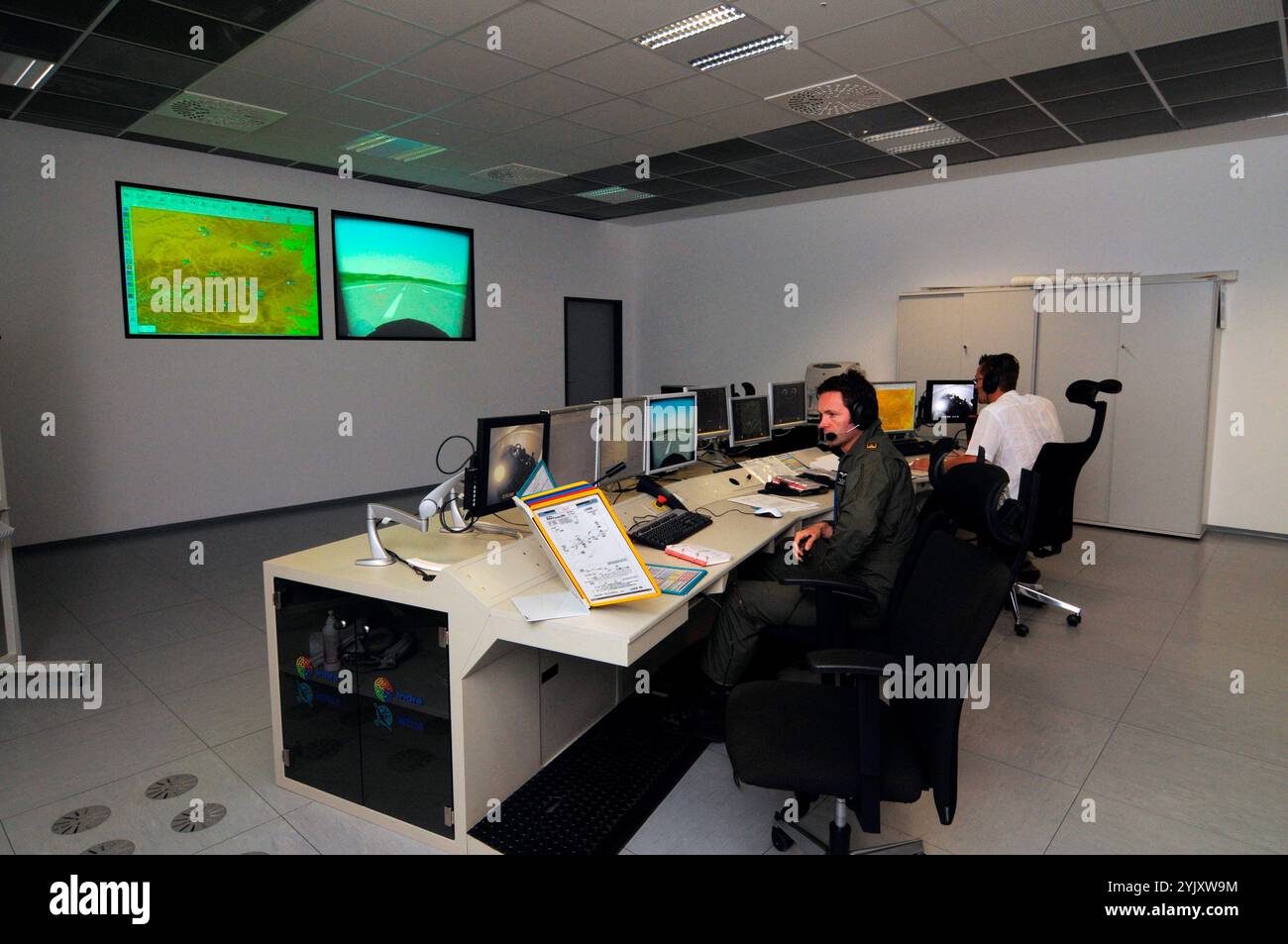 In An Analog Control Room Controlling Machines And Working Processes In An Analog Control Room