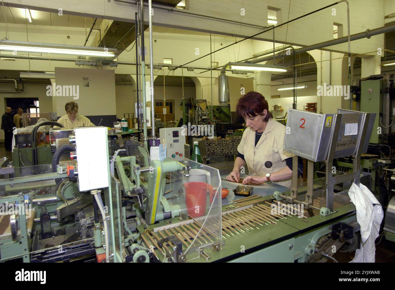 the production and processing of tobacco goods in a factory production ...
