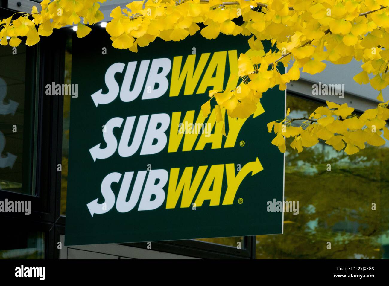 Subway Restaurant Banner on Autumn City Street Exterior Subway logo ...
