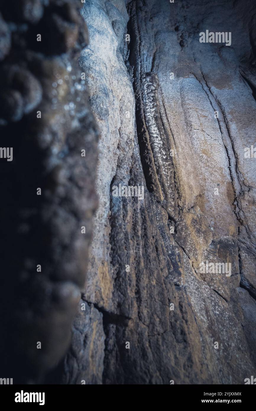 A stone in the Bukit Buntu Kesu Tana Toraja cave is in the shape of a ...