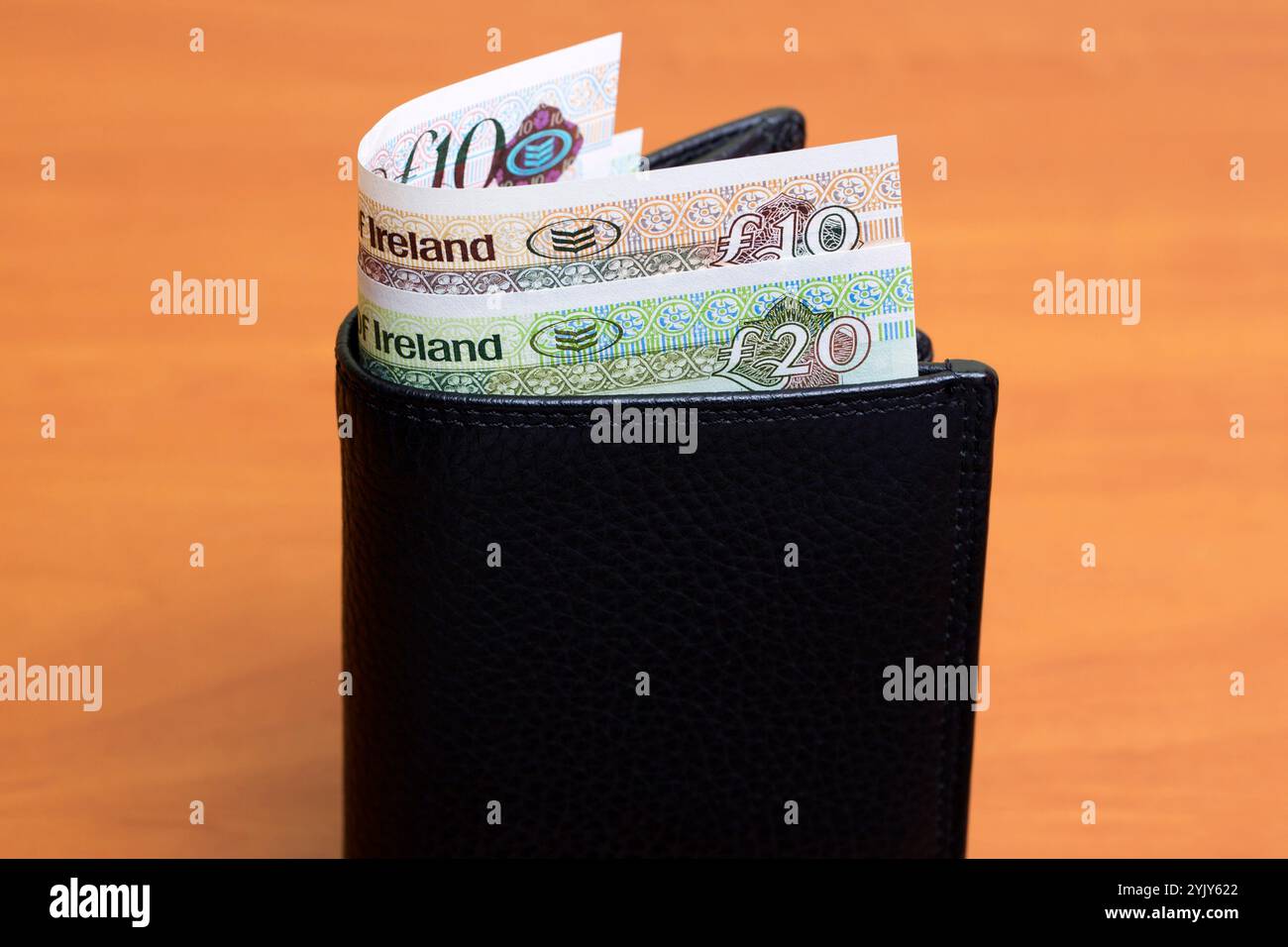 Northern Irish money - pound in the black wallet Stock Photo - Alamy
