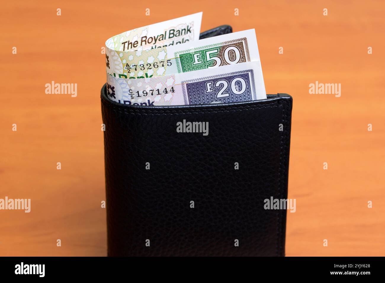 Pound banknote in wallet hi-res stock photography and images - Alamy