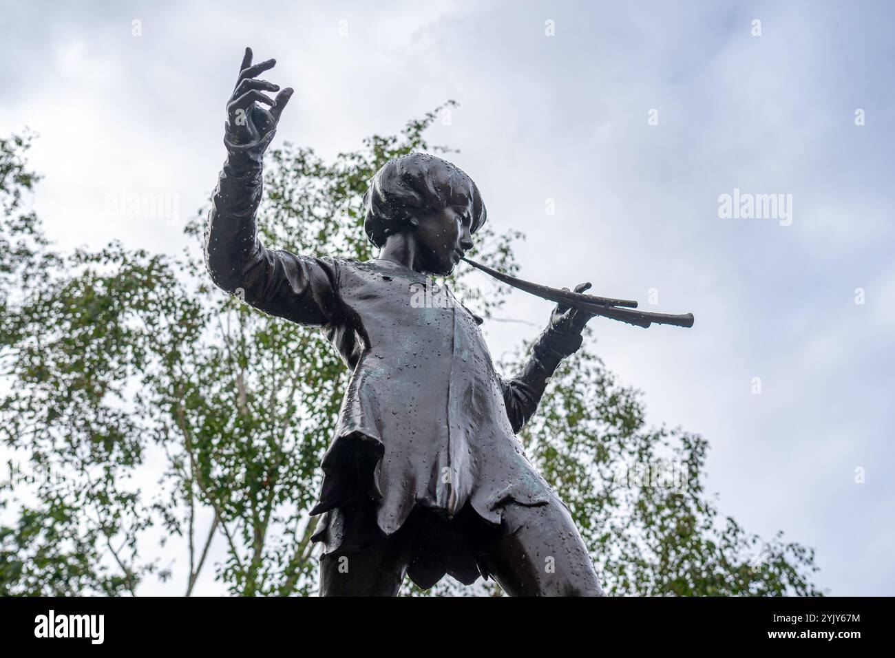 statue of Peter Pan of sculptor George frampton in a garden London ...