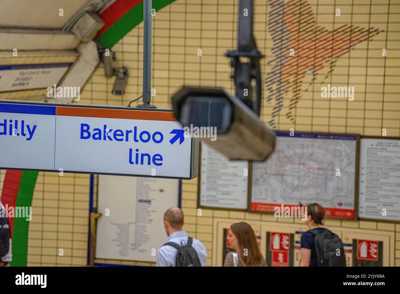 interior of underground atrium with direction sign to Bakerloo line ...
