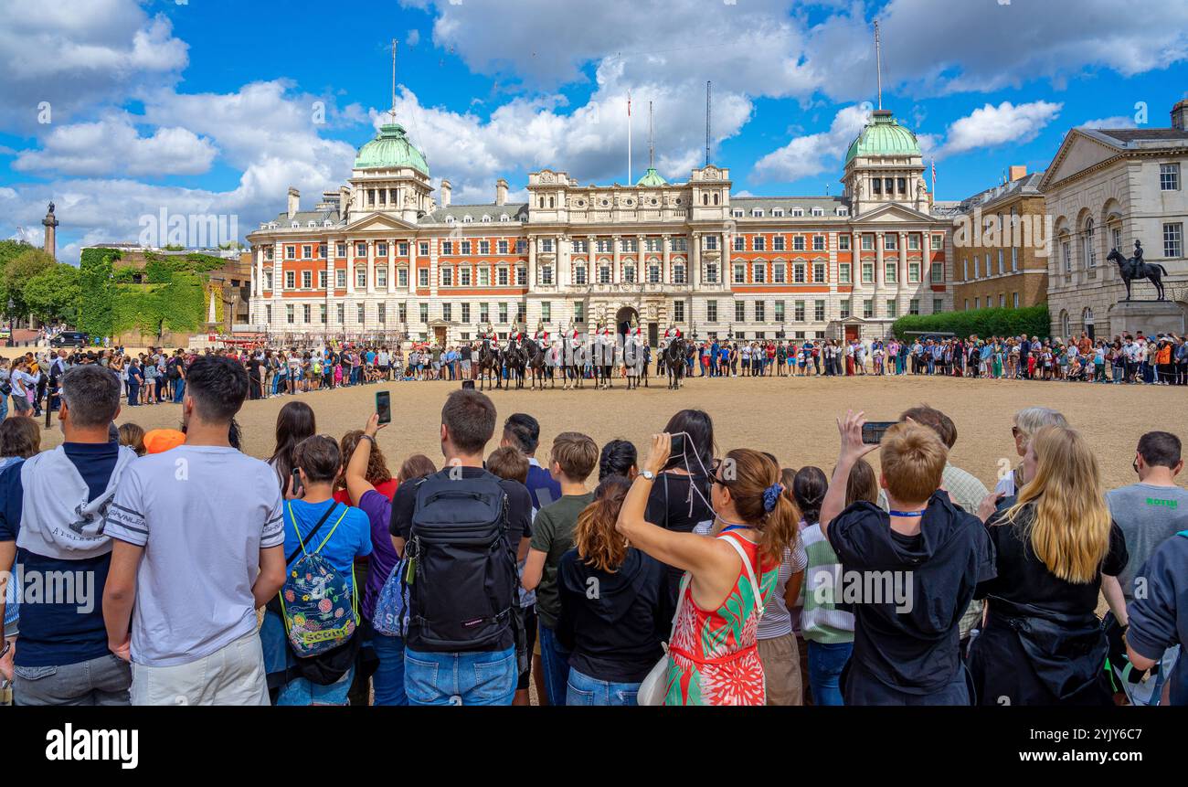 facade of the horse guards parade building with countless horses ...